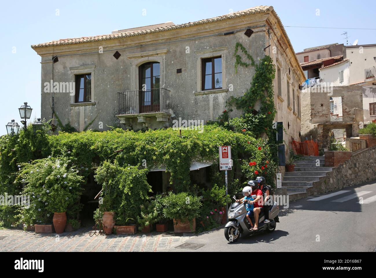 Family on a scooter hi-res stock photography and images - Alamy