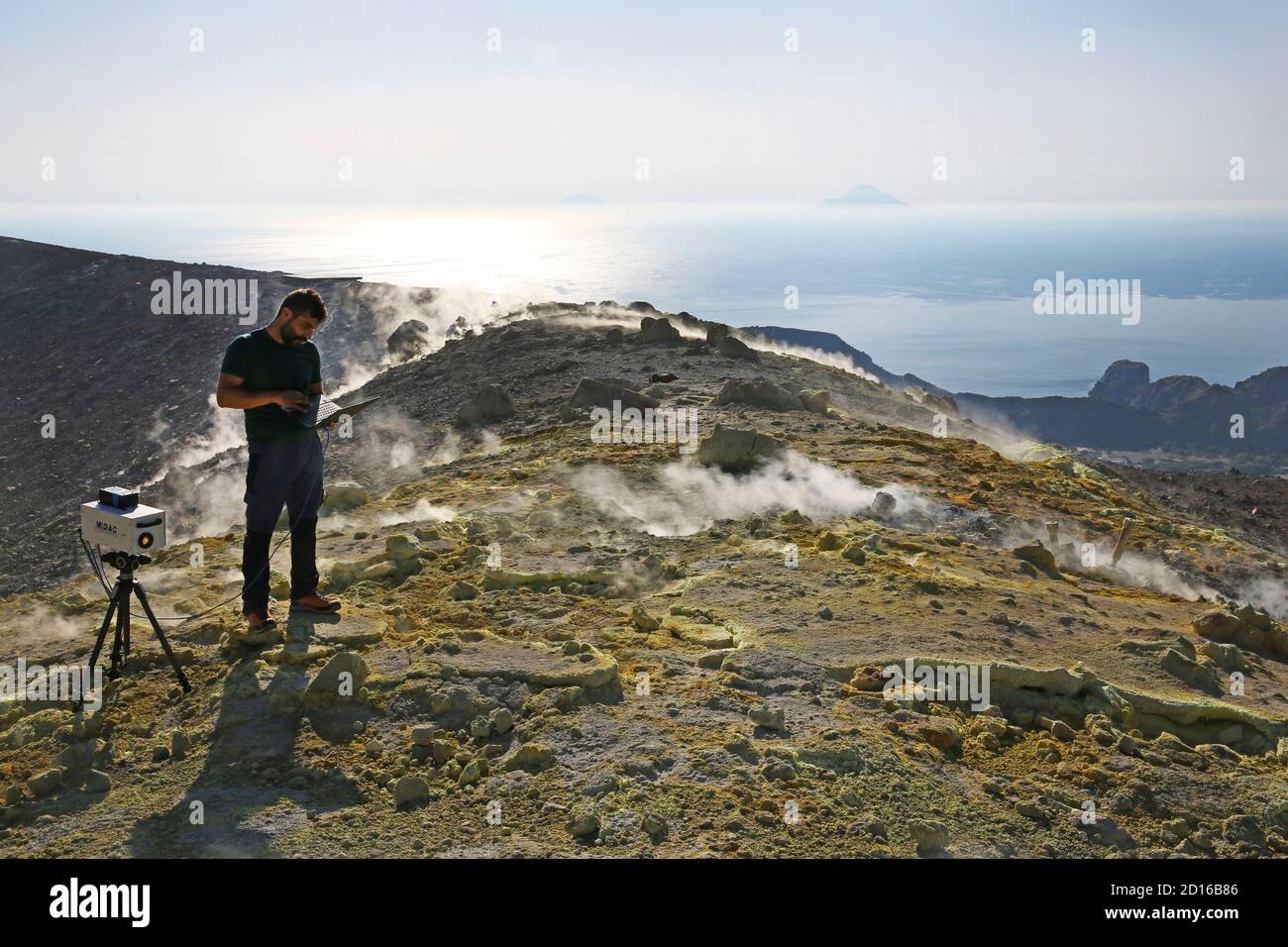 Italy, Sicily, Aeolian islands, Vulcano, vulcanologist taking ...