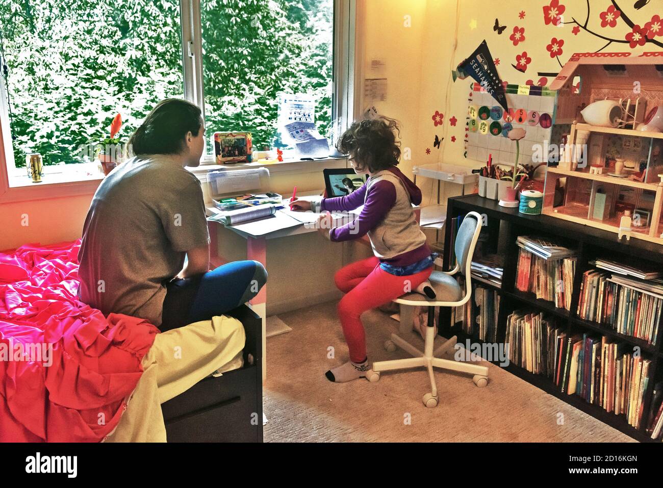 2nd grade student during distance learning class, Washington state, USA ...