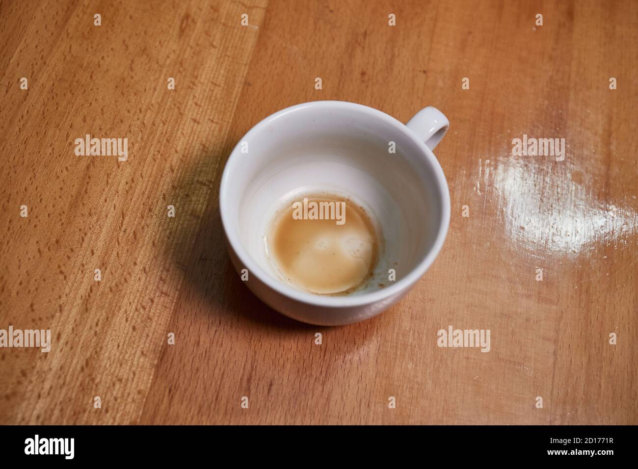 Running out of coffee, empty cup Stock Photo - Alamy