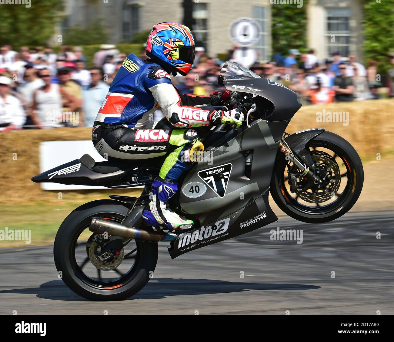Michael Neeves, Triumph Daytona 765 Moto2, pulls a wheelie, Goodwood ...