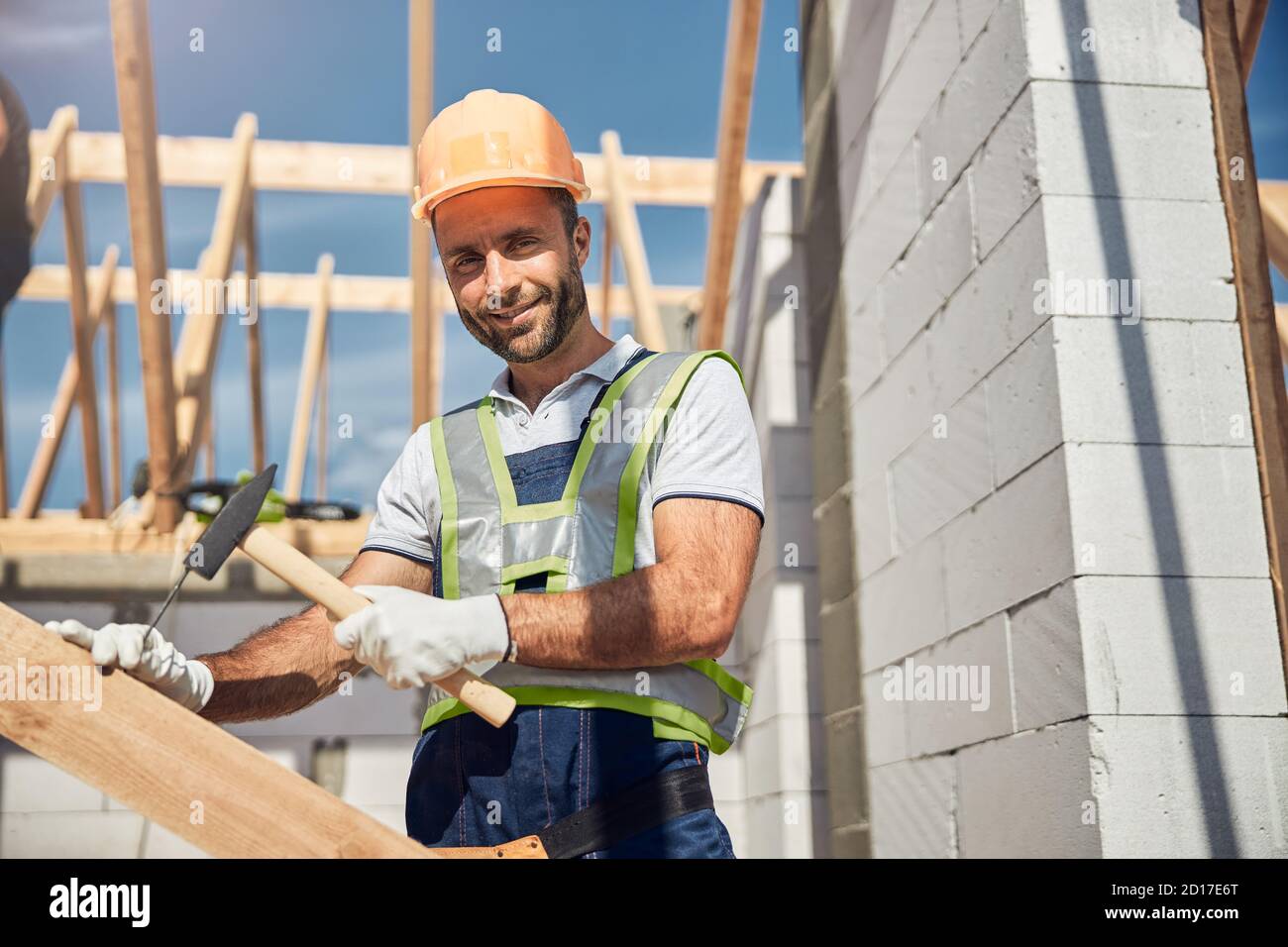 Handsome male person posing on camera while working Stock Photo - Alamy