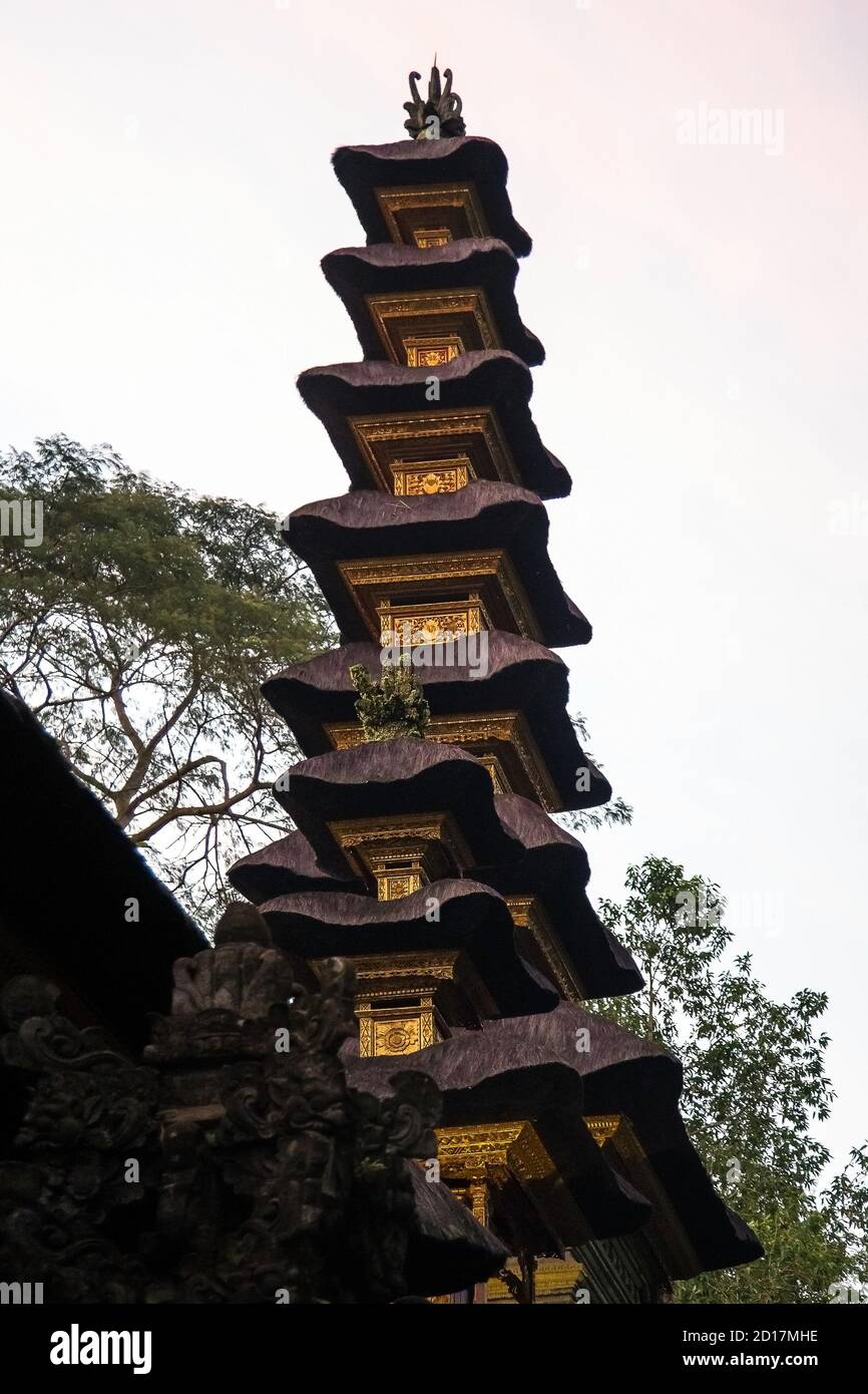 Traditional balinese golden tower of temple, Ubud, Bali, Indonesia ...