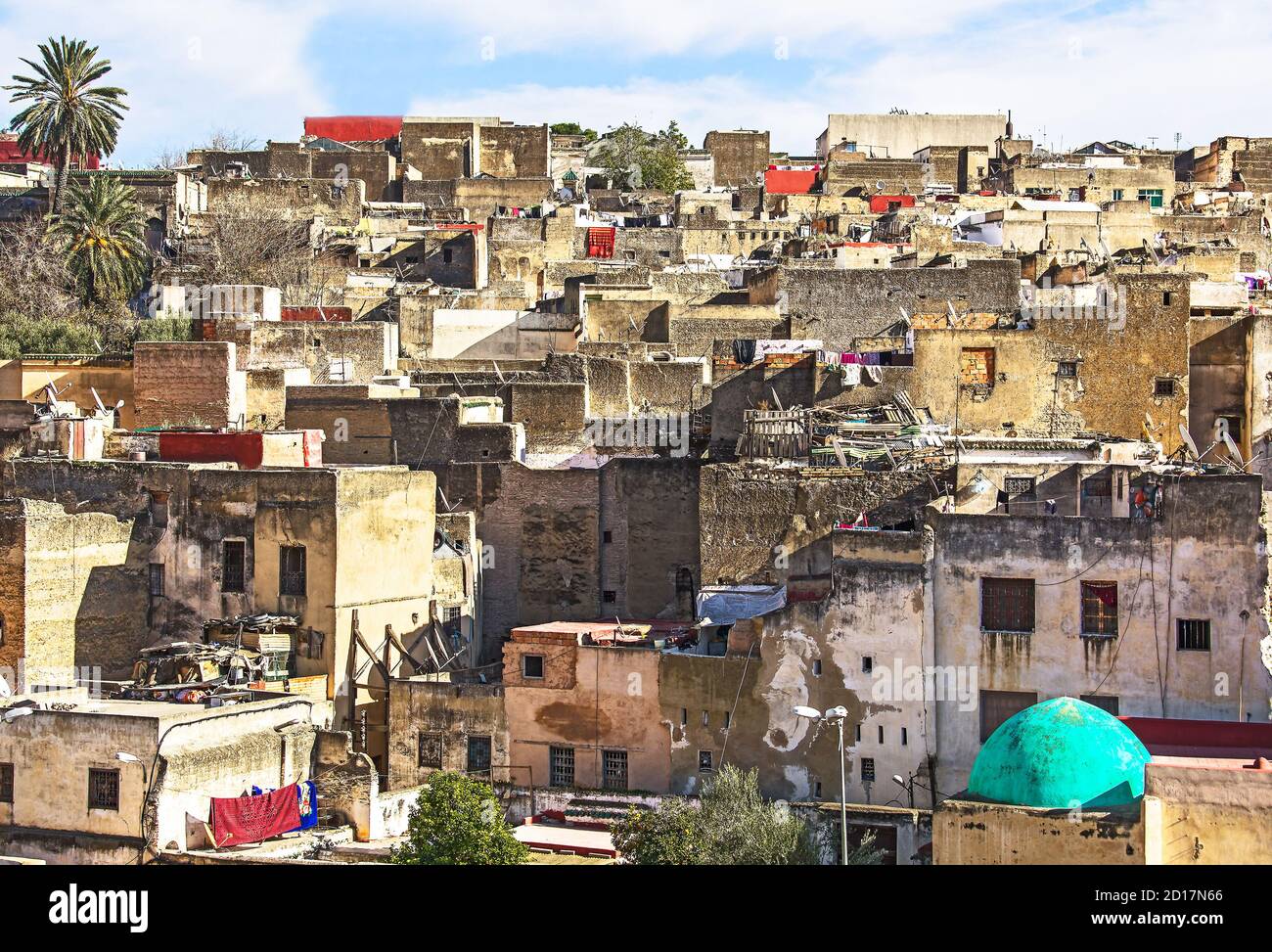 Scenic view of Fes old medina houses against a cloudy sky, Fes, Morocco ...