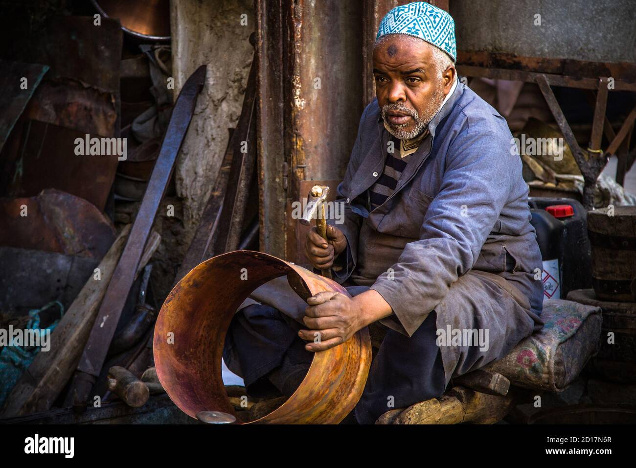 Fes, Morocco - 29 DECEMBER 2019: Portrait of a artisan blacksmith ...