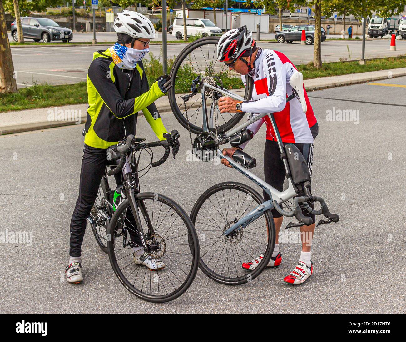 Checking the racing bikes during the tour in Leuk, Switzerland. On the ...
