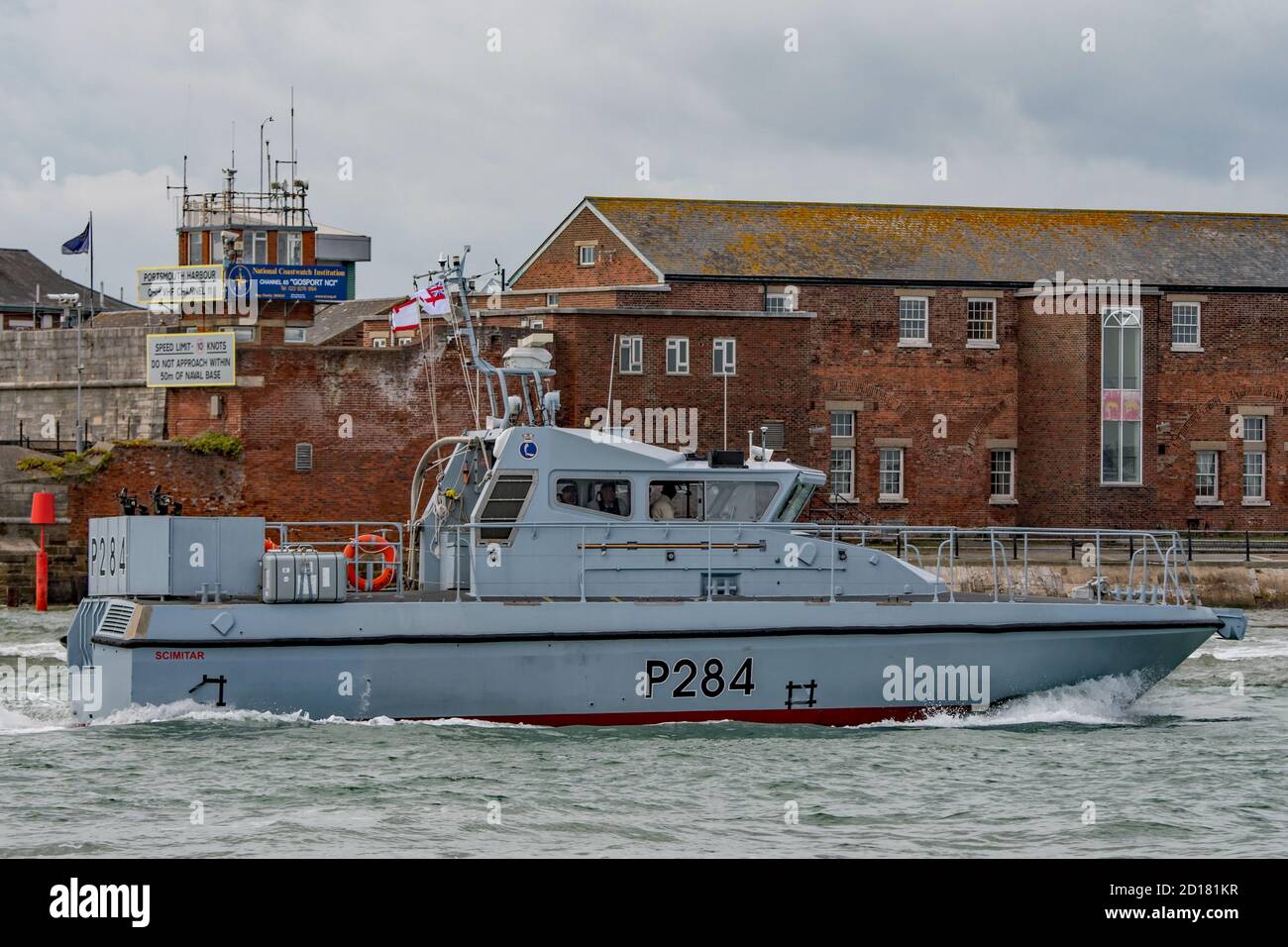 The Royal Navy fast patrol boat HMS Scimitar (P284) arriving at ...