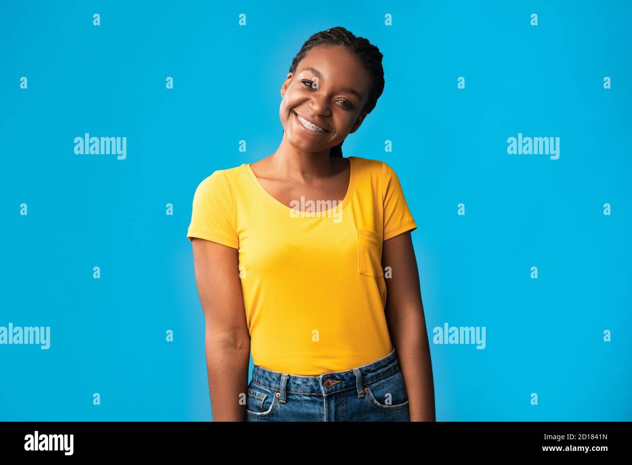 African American Woman With Braces Smiling Posing Over Blue Background ...