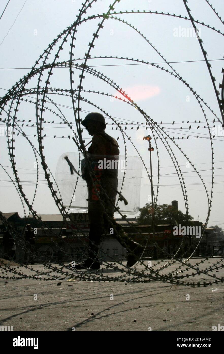 Indian policeman walks hi-res stock photography and images - Alamy
