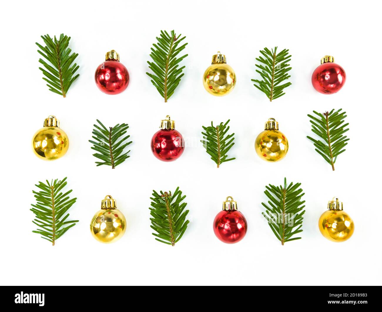 Christmas symmetry composition from toy baubles and fir tree branches ...