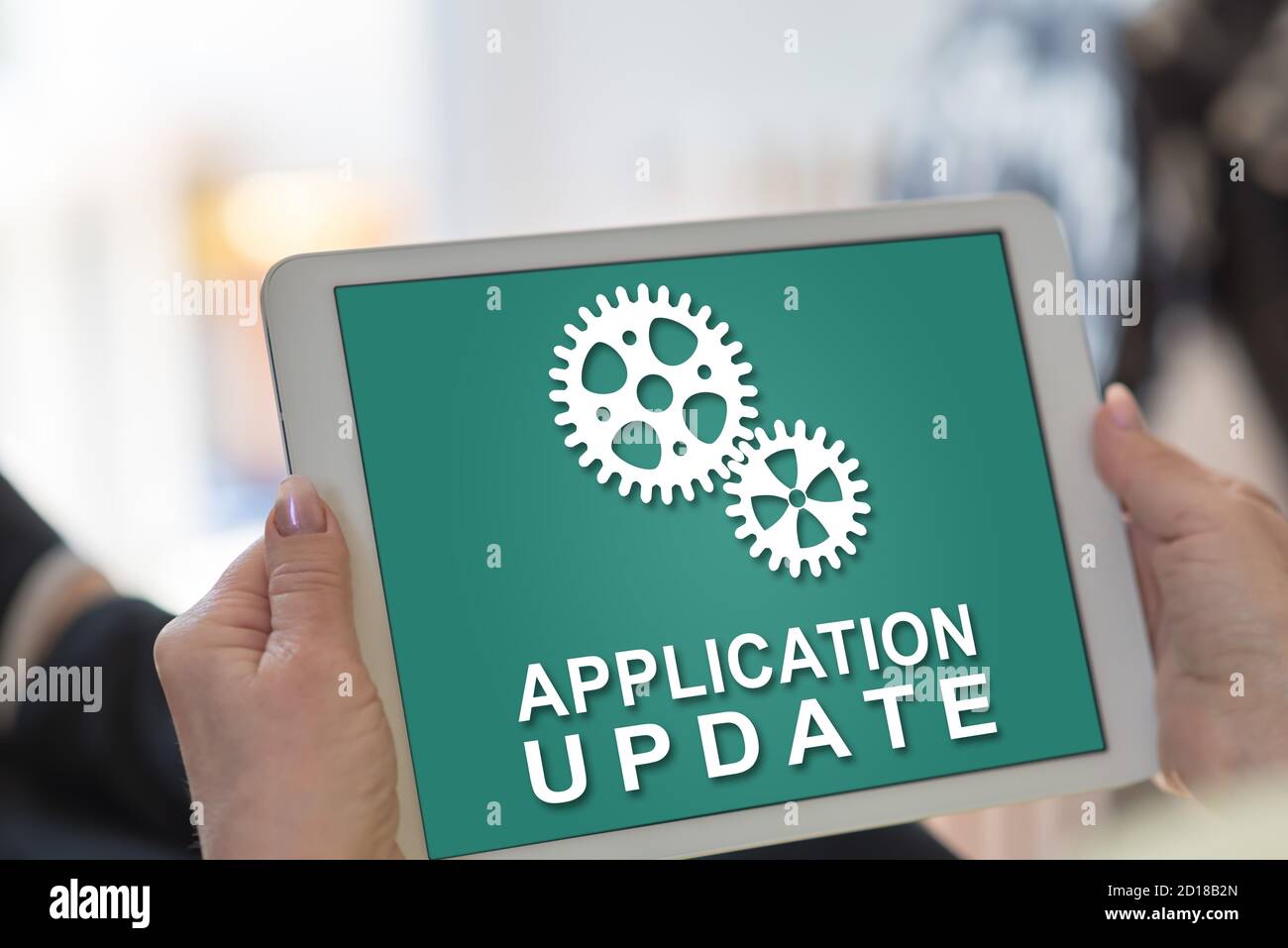 Tablet screen displaying an application update concept Stock Photo - Alamy