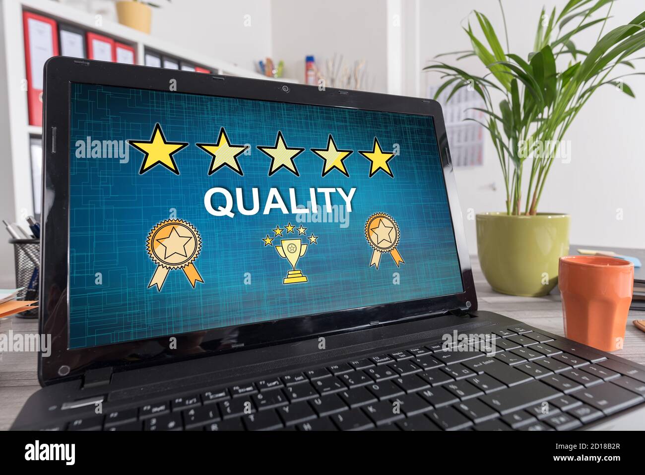 Laptop screen with quality concept Stock Photo - Alamy