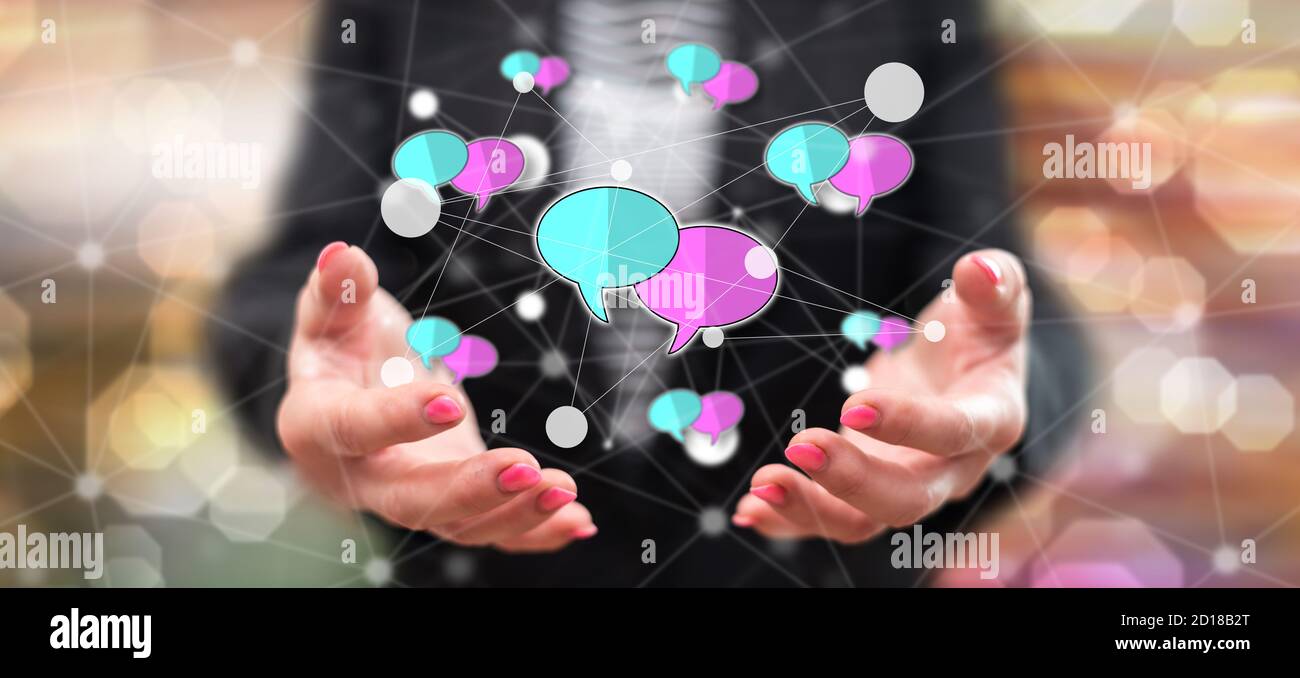 Communication network concept above the hands of a woman in background ...