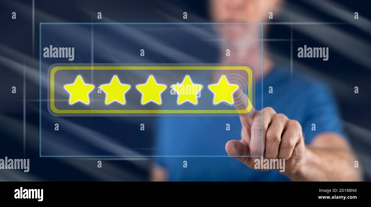 Man touching a quality concept on a touch screen with his finger Stock ...