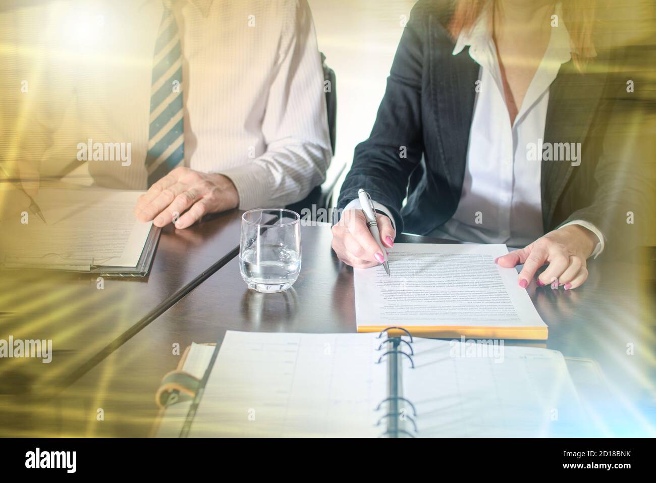 Business people taking notes during a training; multiple exposure Stock ...