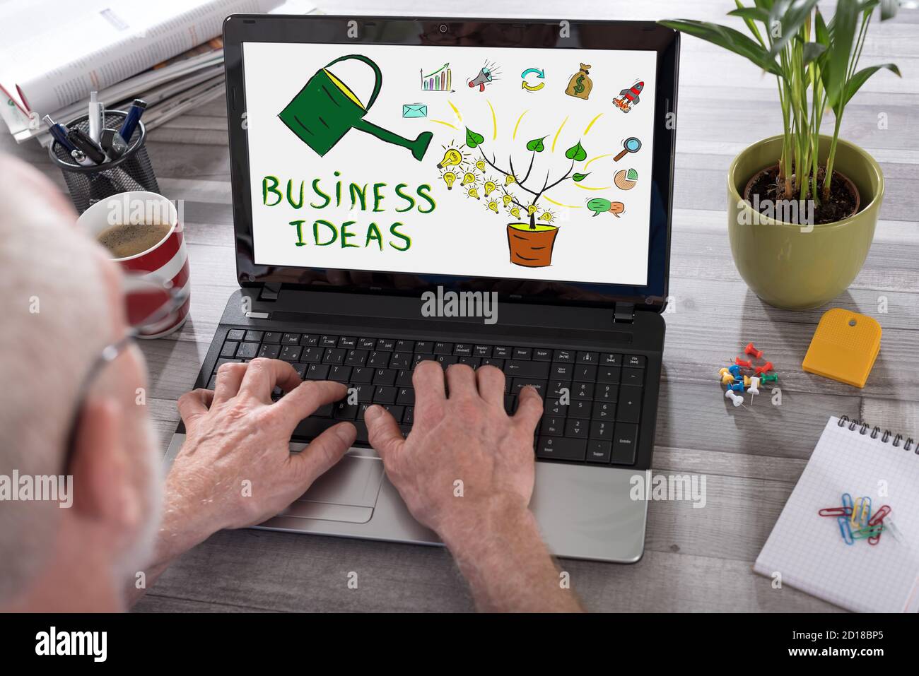 Business ideas concept shown on a laptop used by a man Stock Photo - Alamy