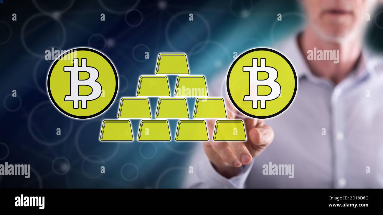 Man touching a bitcoin virtual gold concept on a touch screen with his ...