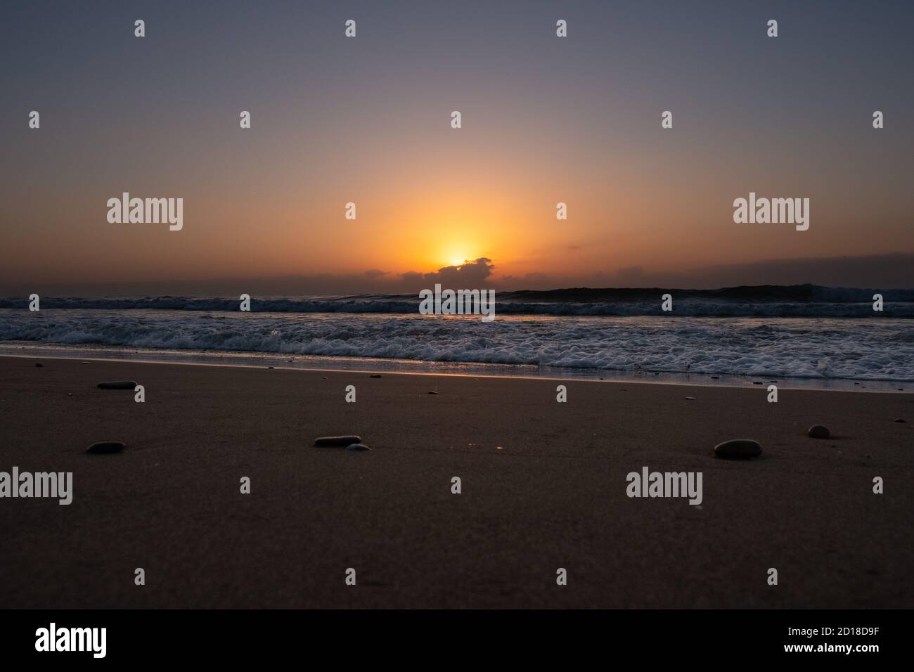 early dawn on the sea beach Stock Photo - Alamy