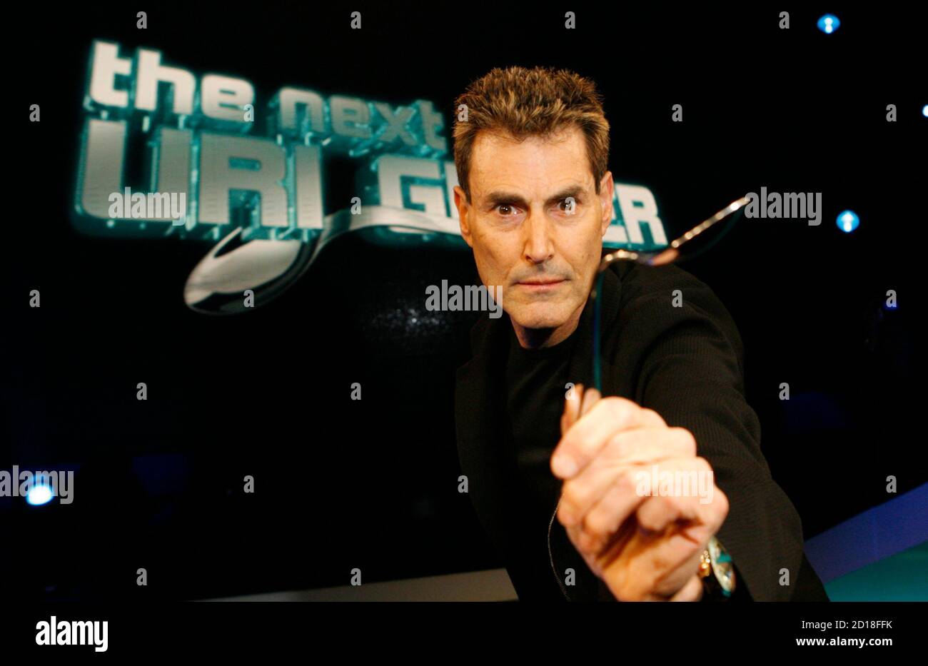 Uri geller bent spoon hi-res stock photography and images - Alamy