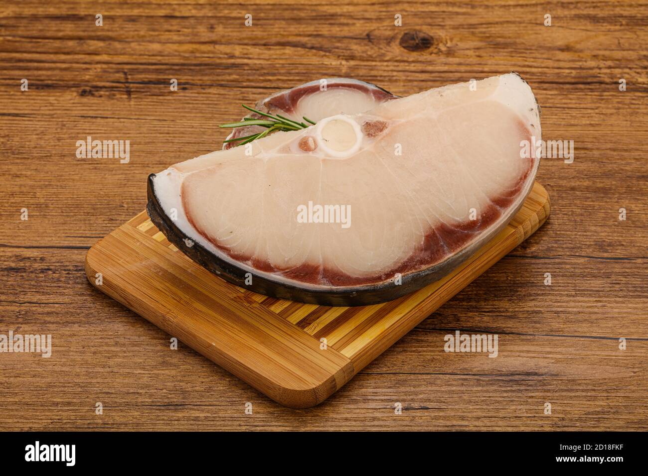 Raw shark steak served rosemary for cooking Stock Photo - Alamy