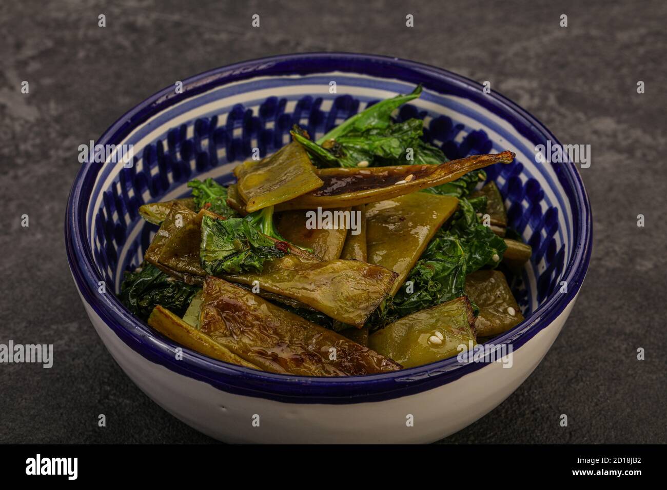 Vagan cuisine with roasted green bean and cabbage Stock Photo - Alamy
