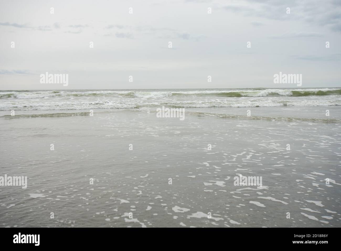 A View of the Horizon Over the Ocean at the Beach on an Overcast Sky ...