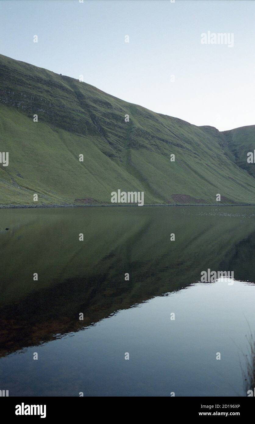 Brecon beacons lake with reflections hi-res stock photography and ...