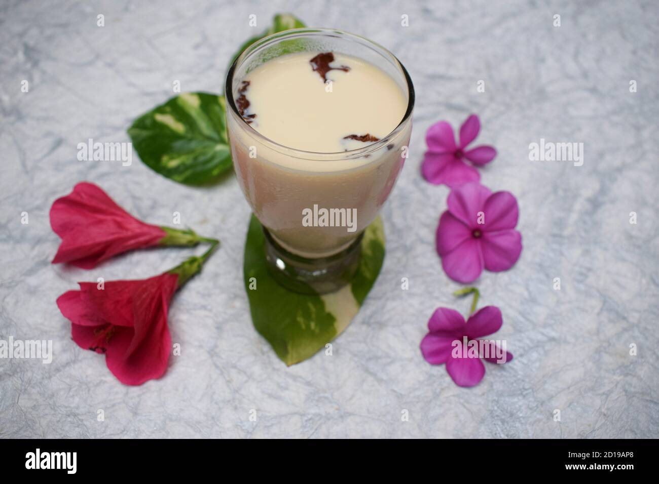 Badam milkshake Indian bevarage flavored with almond, cardamom, rose ...