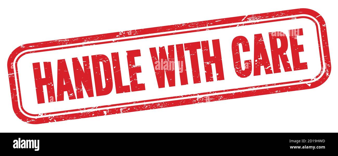 HANDLE WITH CARE text on red grungy rectangle stamp Stock Photo - Alamy