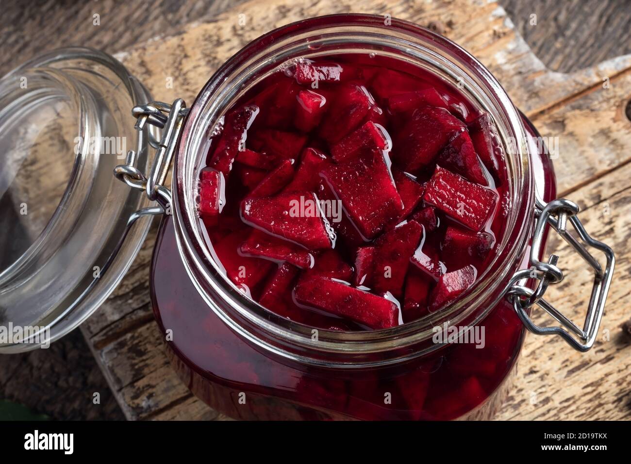 Sliced fermented red beets in a glass jar Stock Photo - Alamy