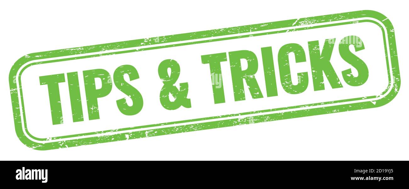 TIPS & TRICKS text on green grungy vintage rectangle stamp Stock Photo ...