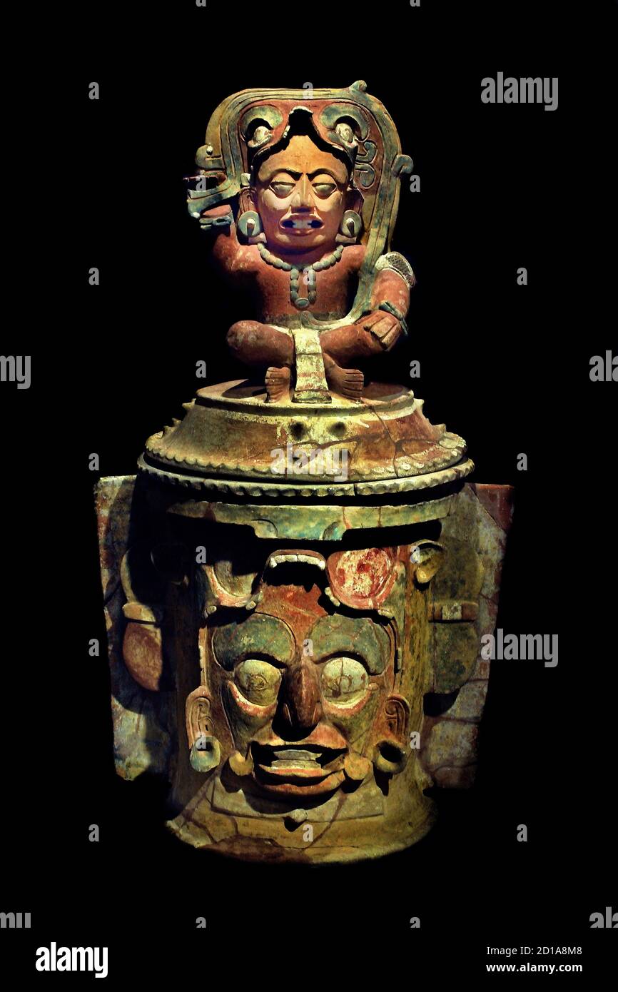 Funerary urn with depiction of the solar god Kinich Ahau and the image ...
