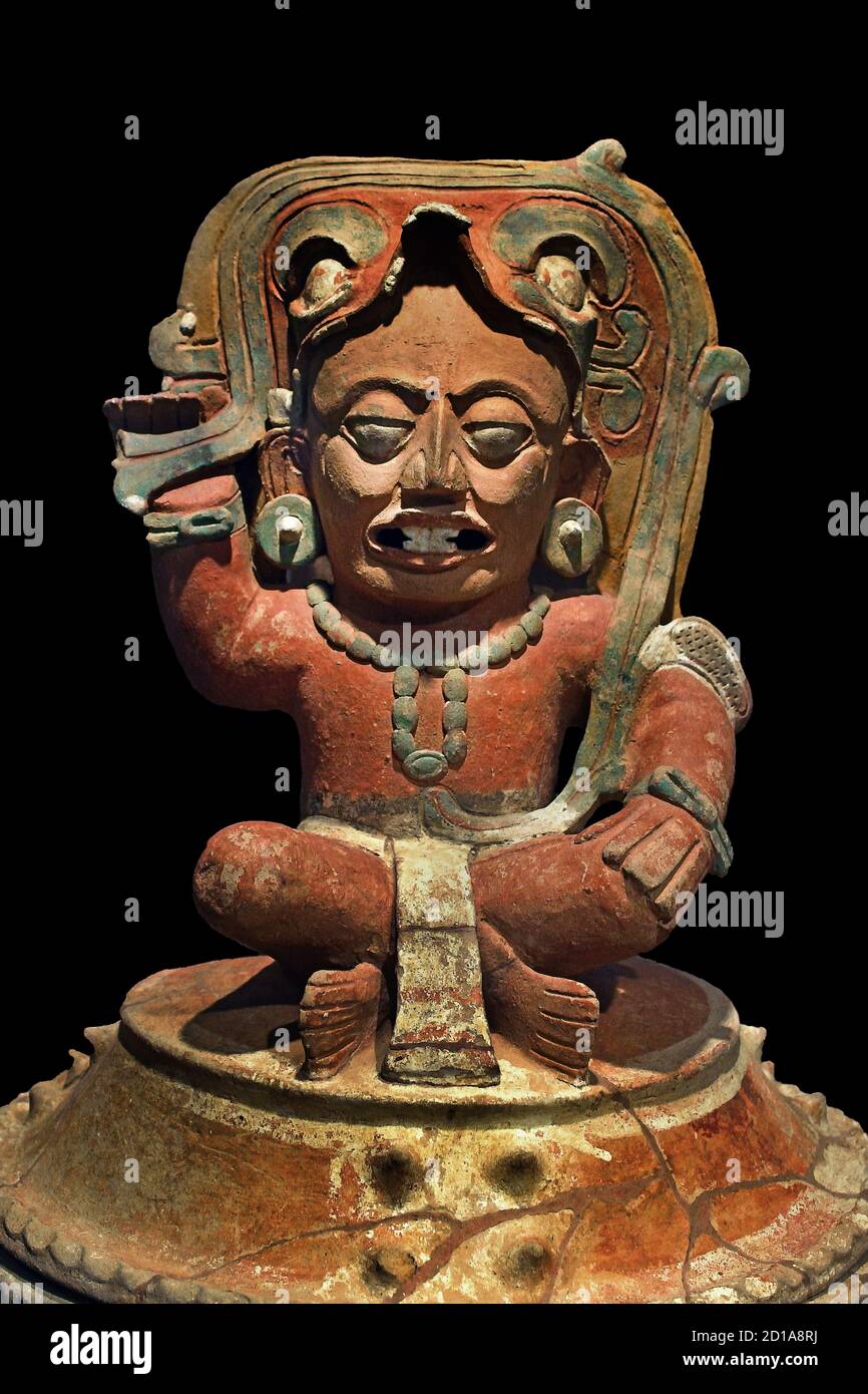 Funerary urn with depiction of the solar god Kinich Ahau and the image ...