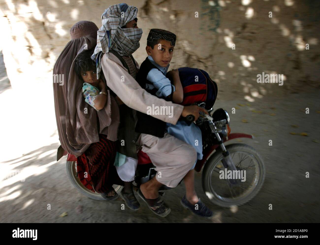 Afghan family motorcycle hi-res stock photography and images - Alamy