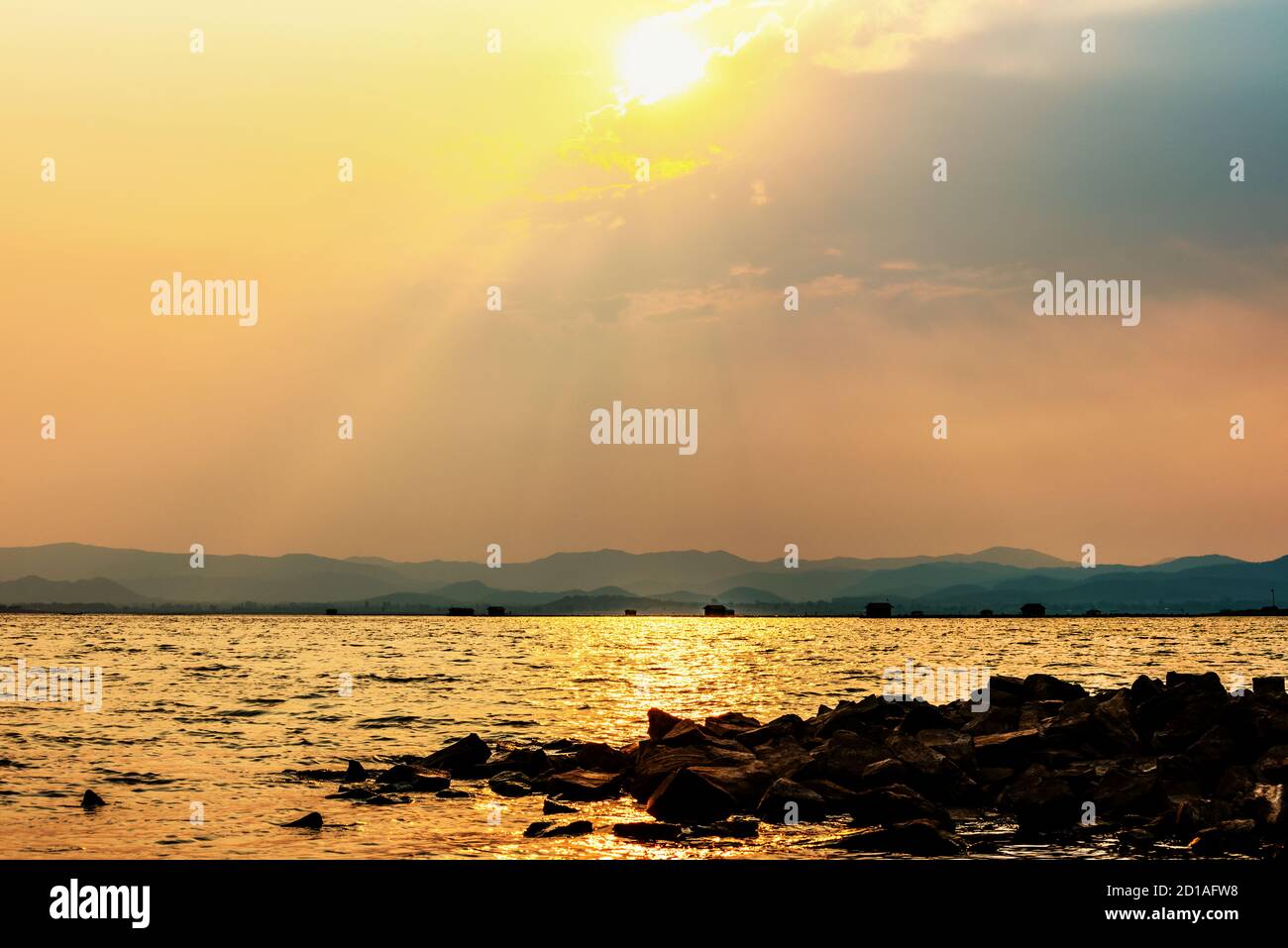 Beautiful nature landscape sun shines bright golden in the cloud ...