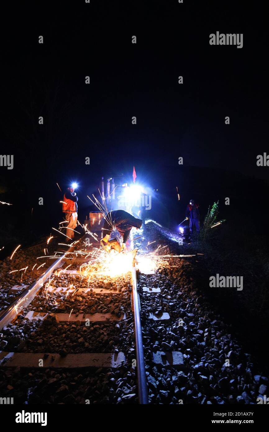 Rail cutting works at night Stock Photo - Alamy