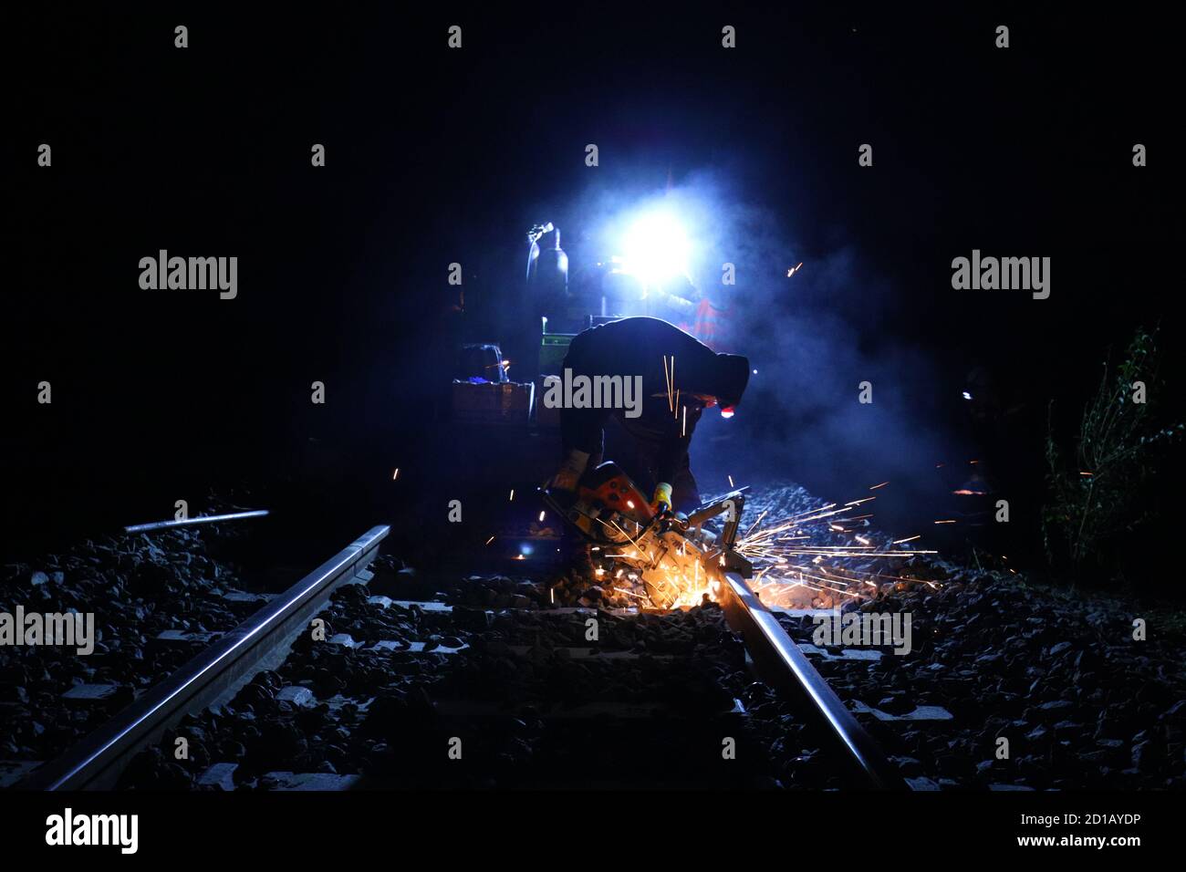 Rail cutting works at night Stock Photo - Alamy