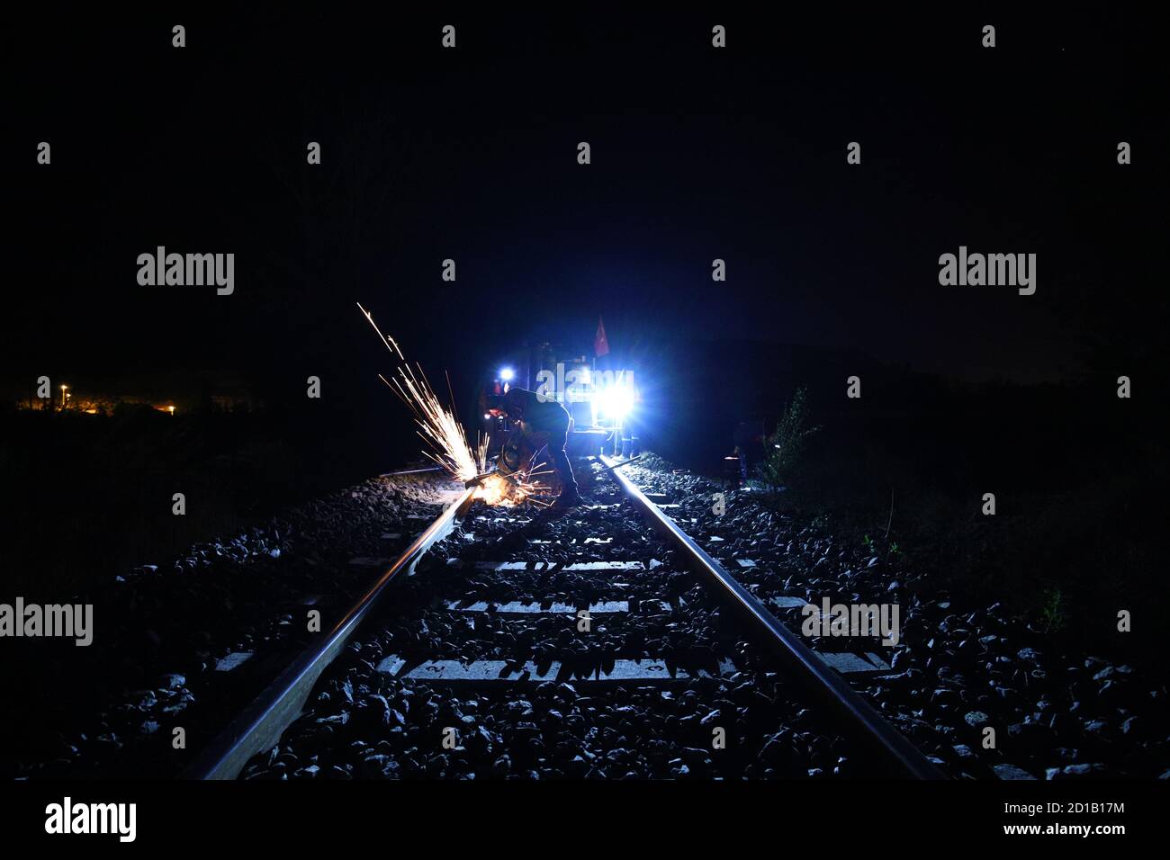 Rail cutting works at night Stock Photo - Alamy