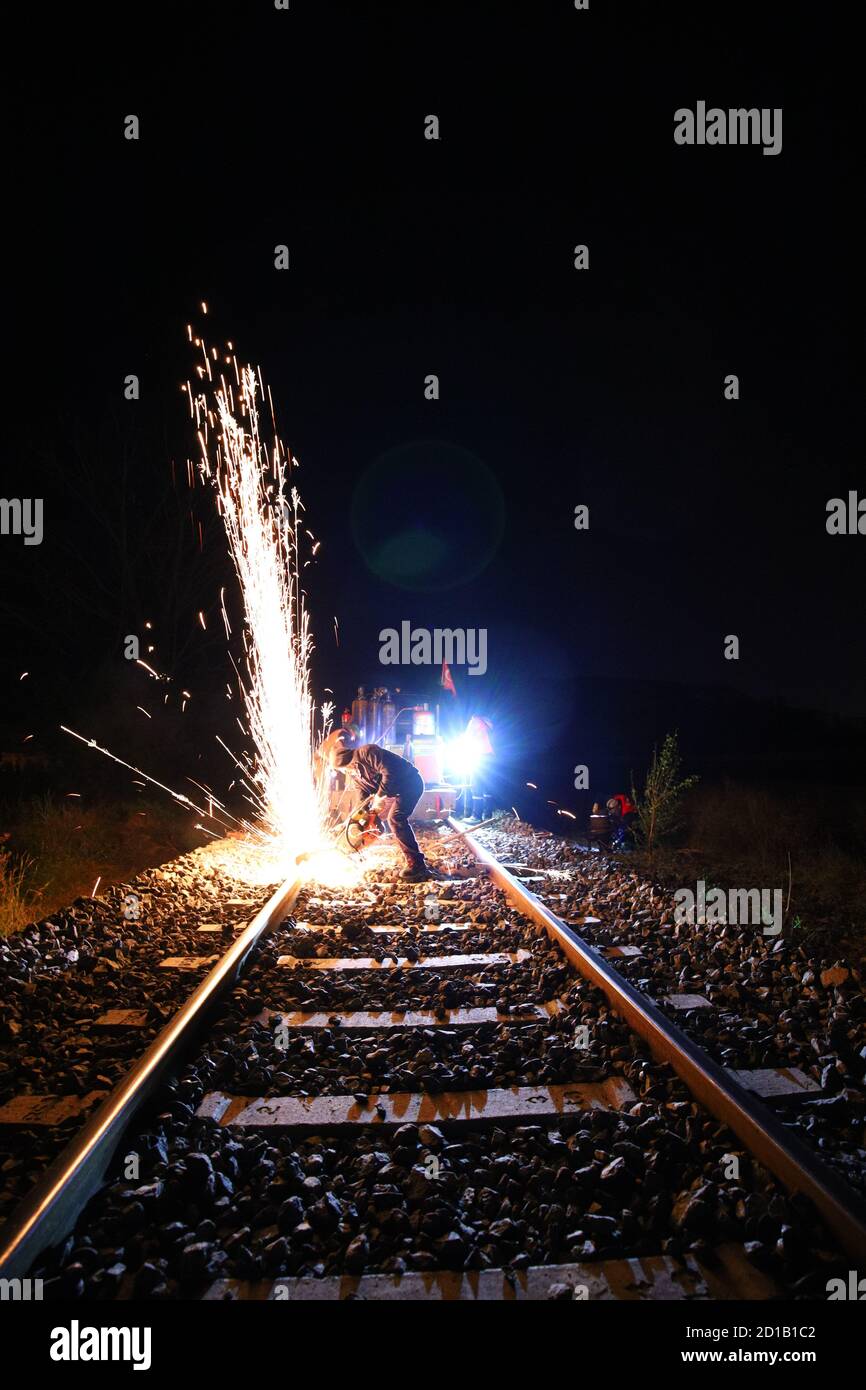 Rail cutting works at night Stock Photo - Alamy