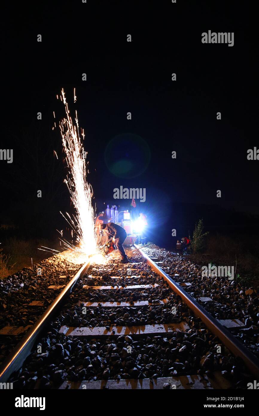 Rail cutting works at night Stock Photo - Alamy
