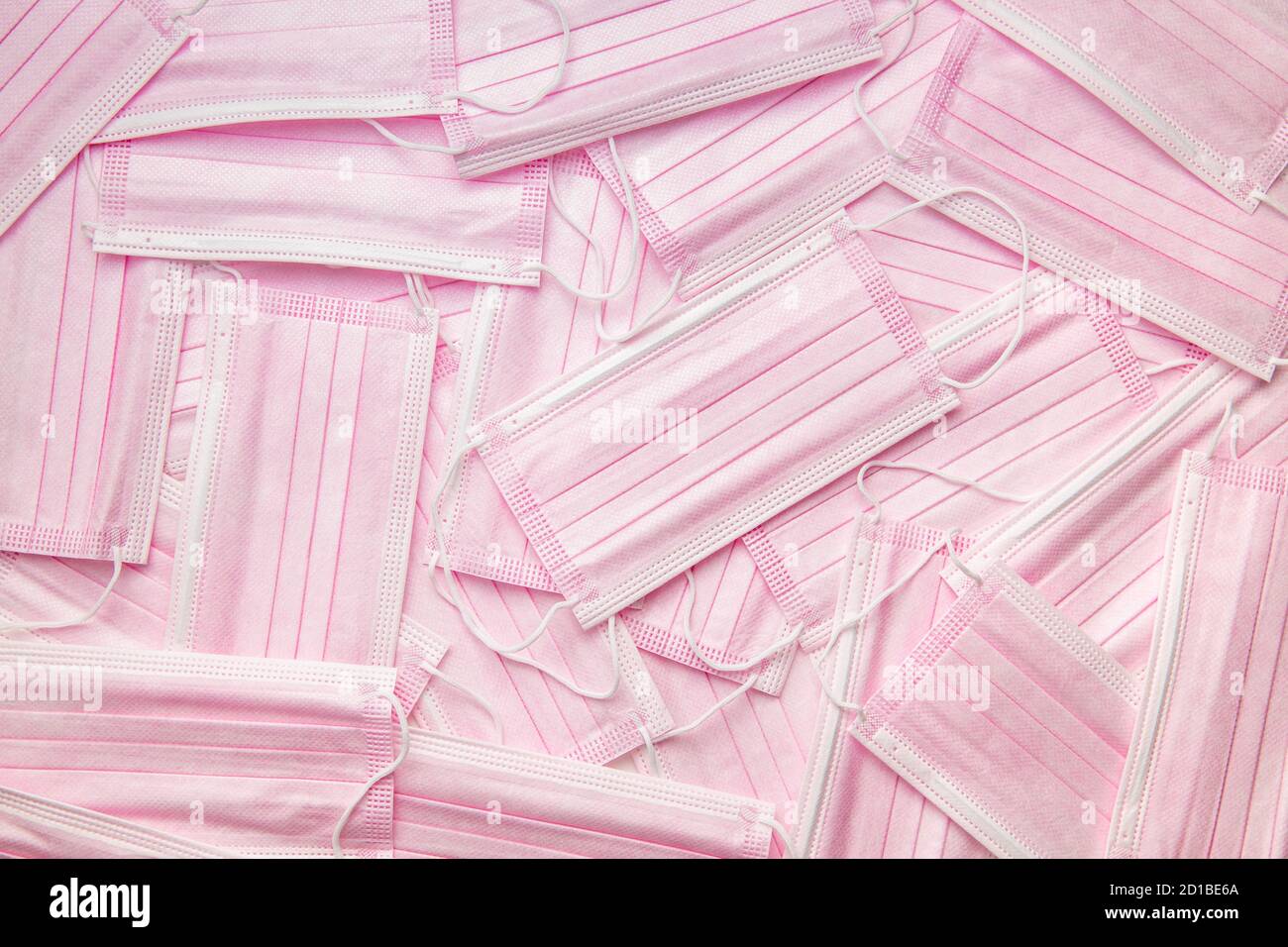 Corona virus protection. Pink medical paper face masks. Top view Stock ...