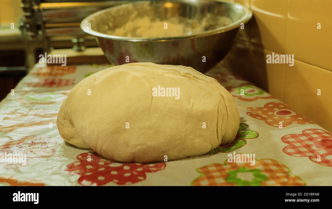 big mass of pastry resting on the kitchen table Stock Photo - Alamy