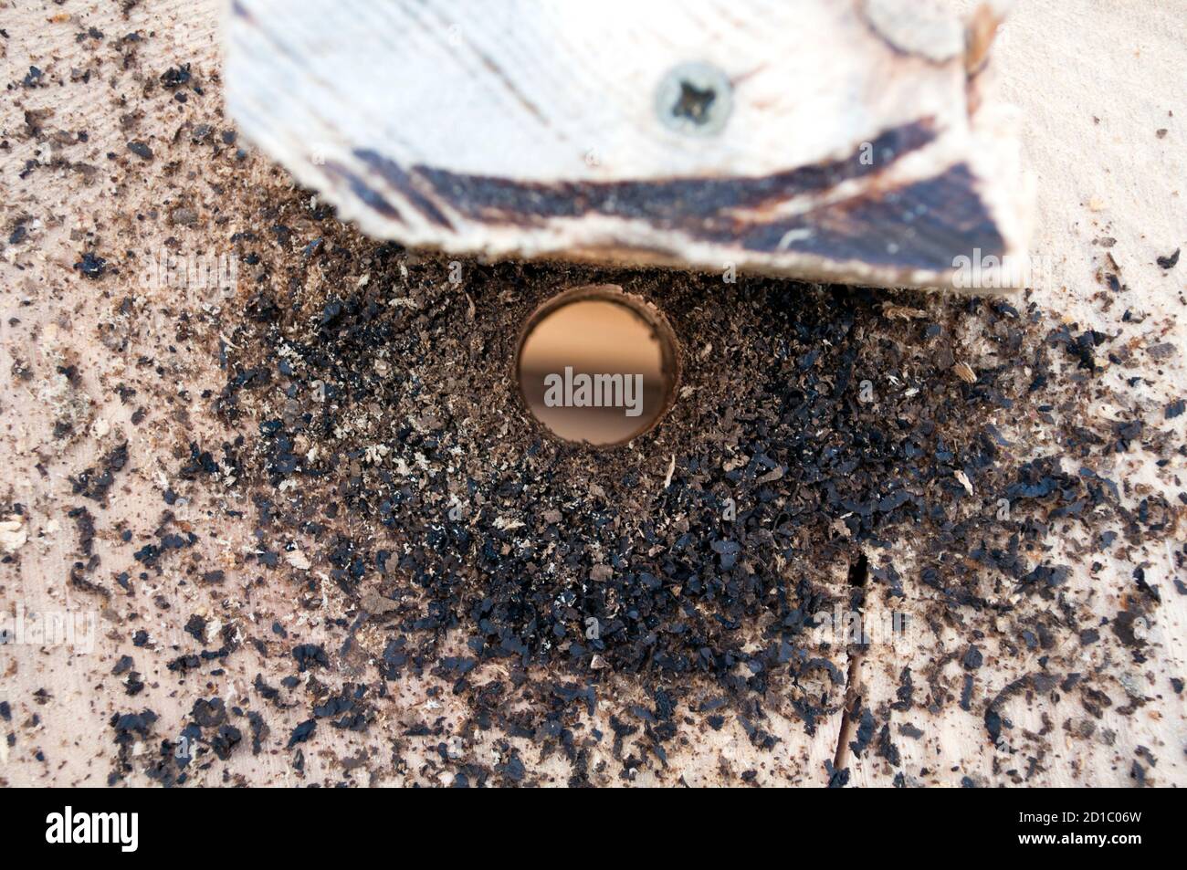 Drilling a hole in a wooden board at high speed. Consequences of work ...