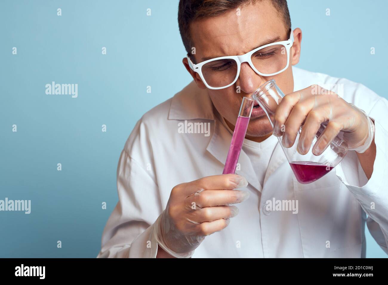 man holding flasks colorful liquid chemical laboratory model wearing ...