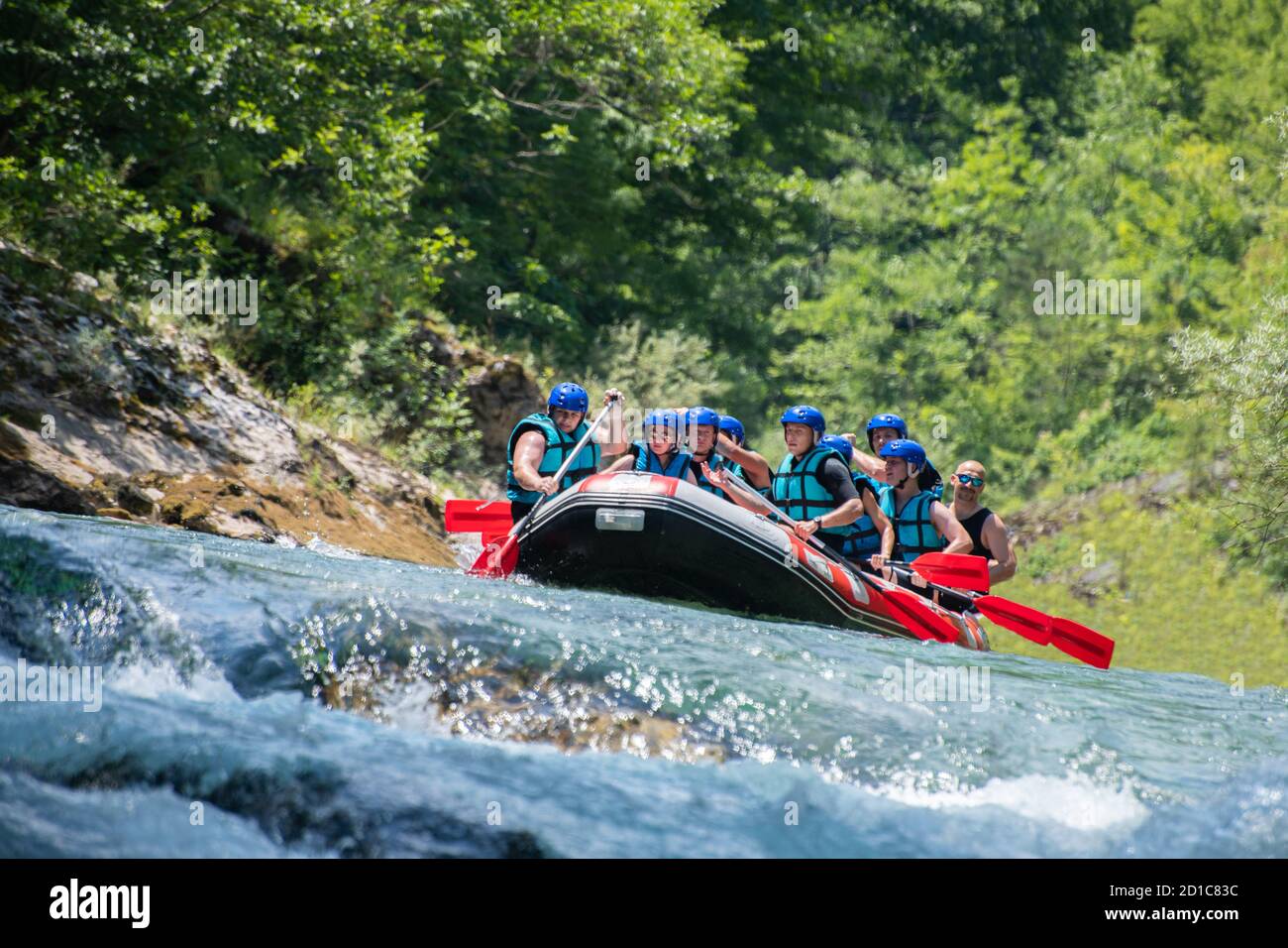 Rafting team goes down the river on the beautiful sunny day Stock Photo ...