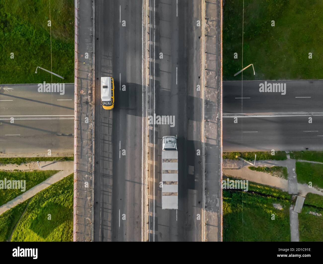 Bridge with cars over the road, drone view from top to bottom. City ...