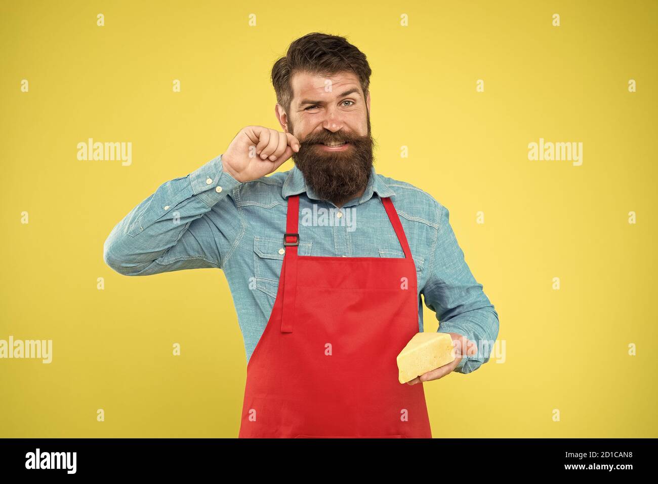 delicious and healthy. hipster with beard in chef apron. Dairy food ...
