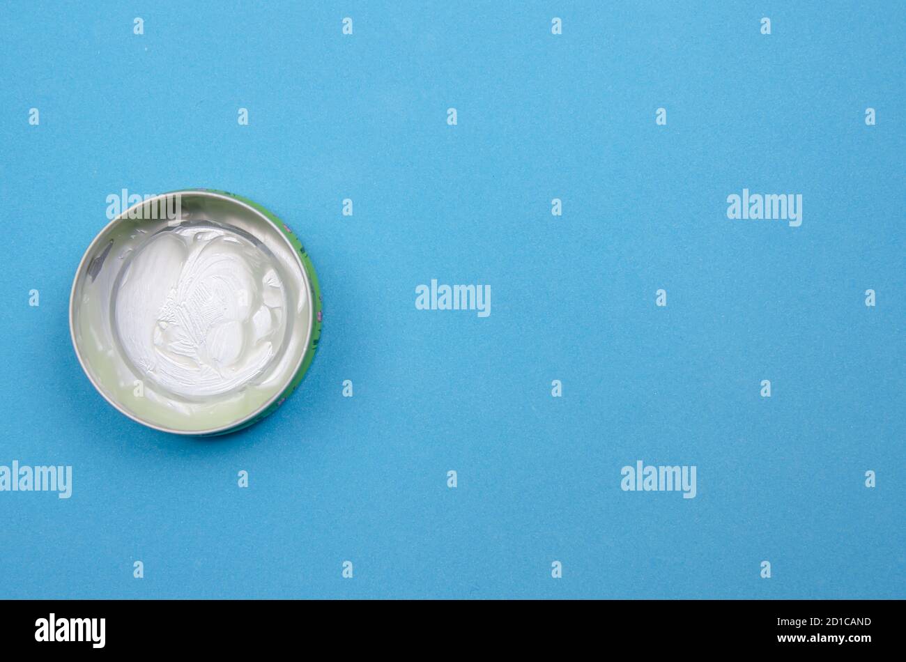 empty can of cream on a blue background with copy space, top view Stock ...