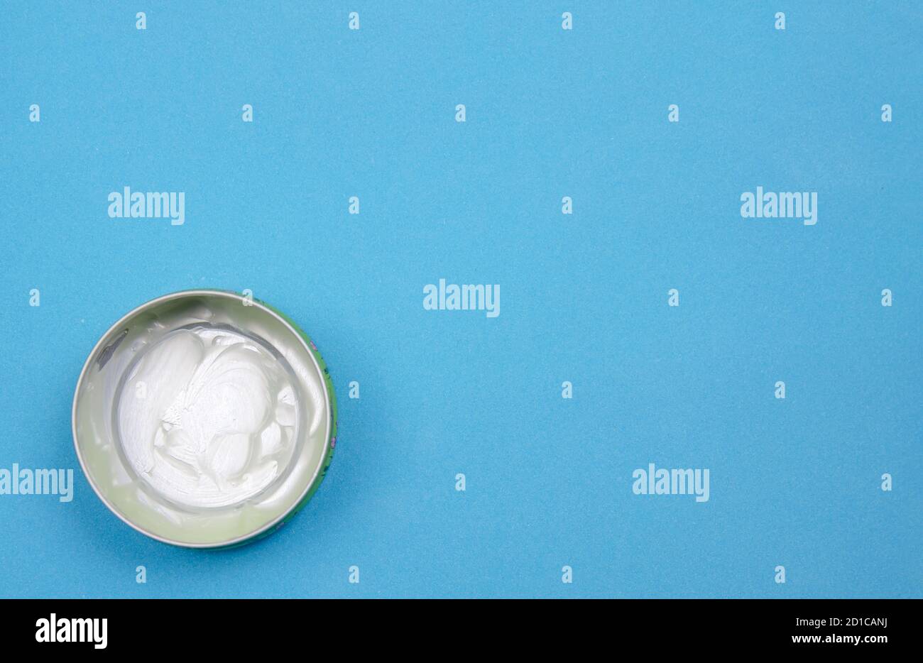 empty can of cream on a blue background with copy space, top view Stock ...