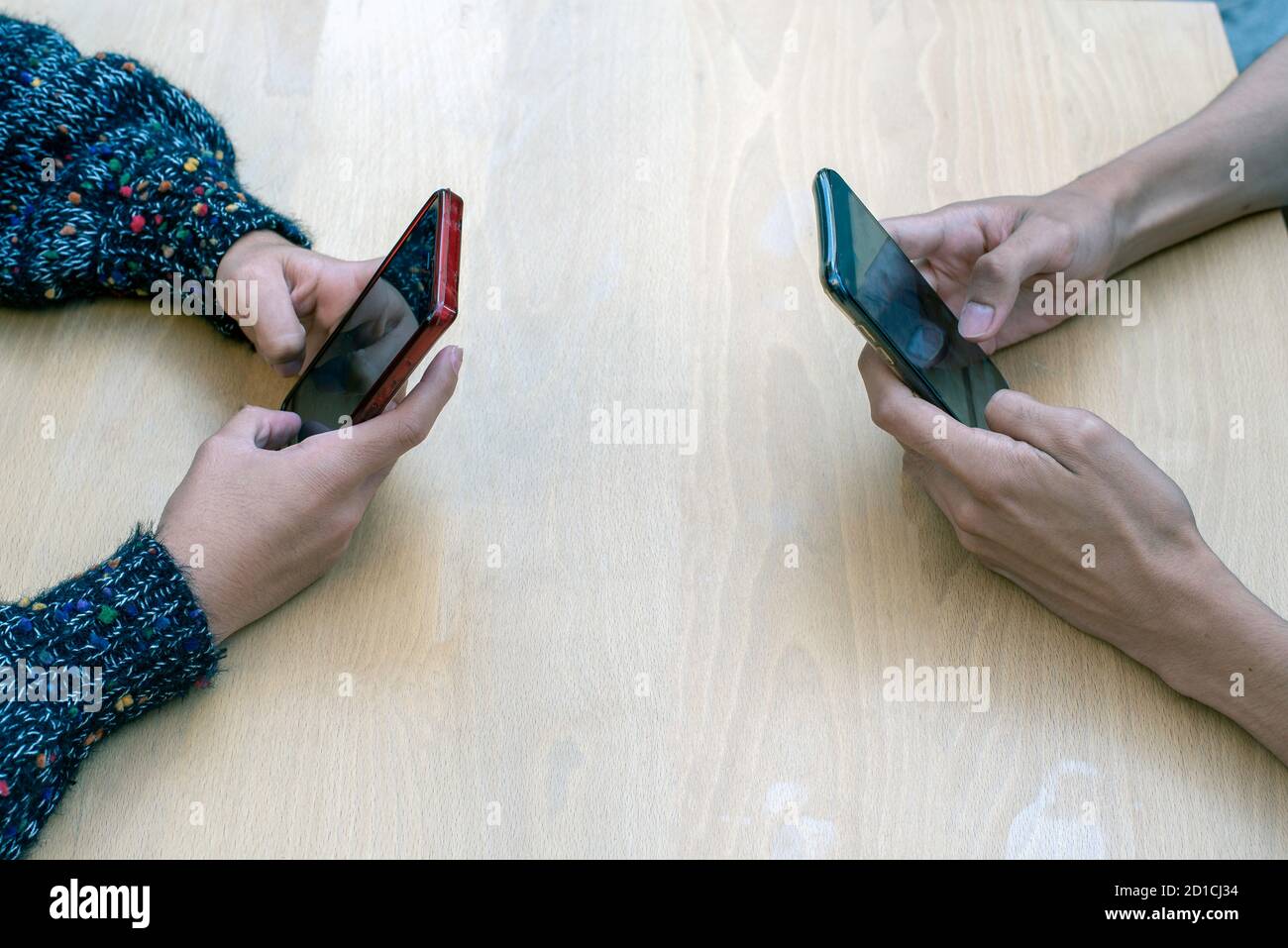 Two people facing hi-res stock photography and images - Alamy